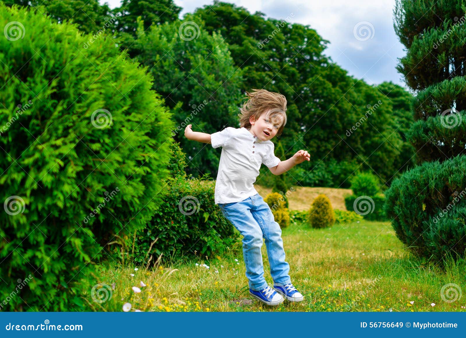 Happy Little Boy Playing and Jumping in the Park Stock Image - Image of ...