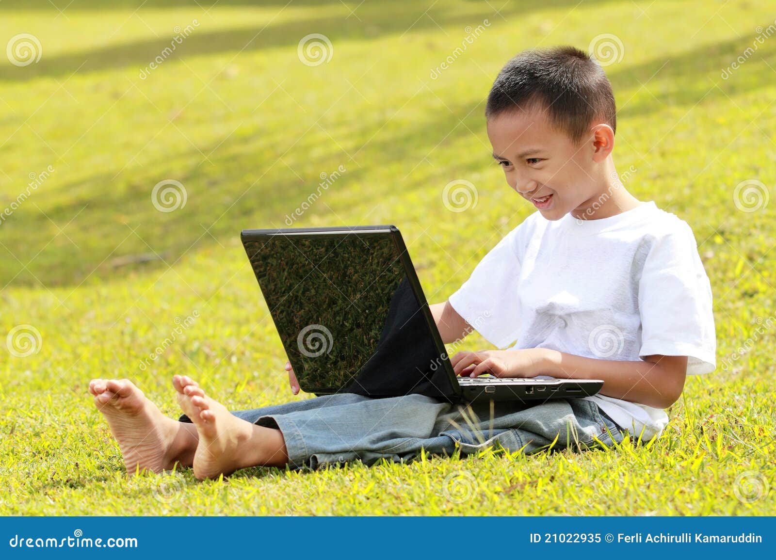 Happy Little Boy Playing Laptop Stock Image - Image of lawn, health ...