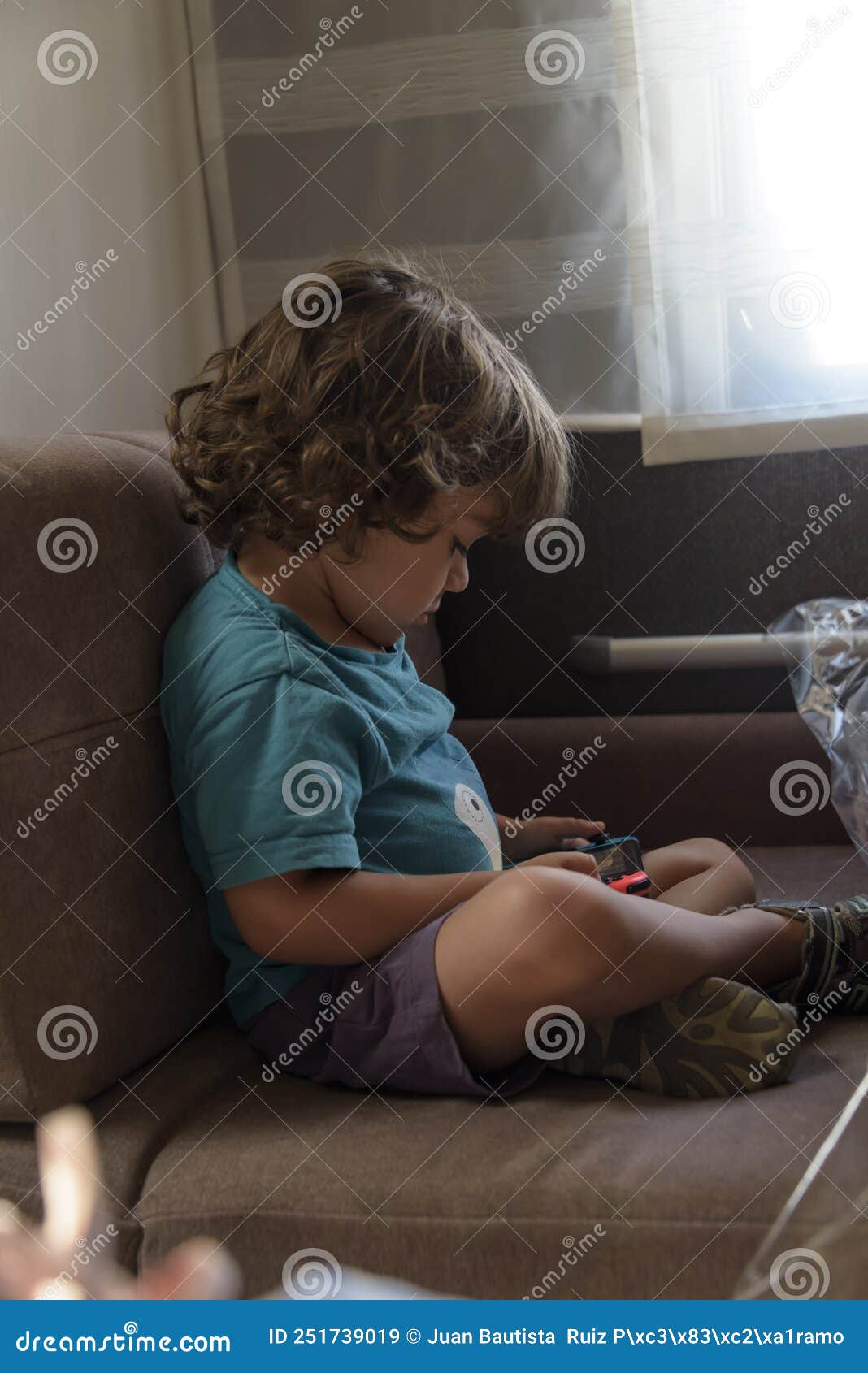 Happy Little Boy Playing Video Games. Child Using Video Game Controller ...