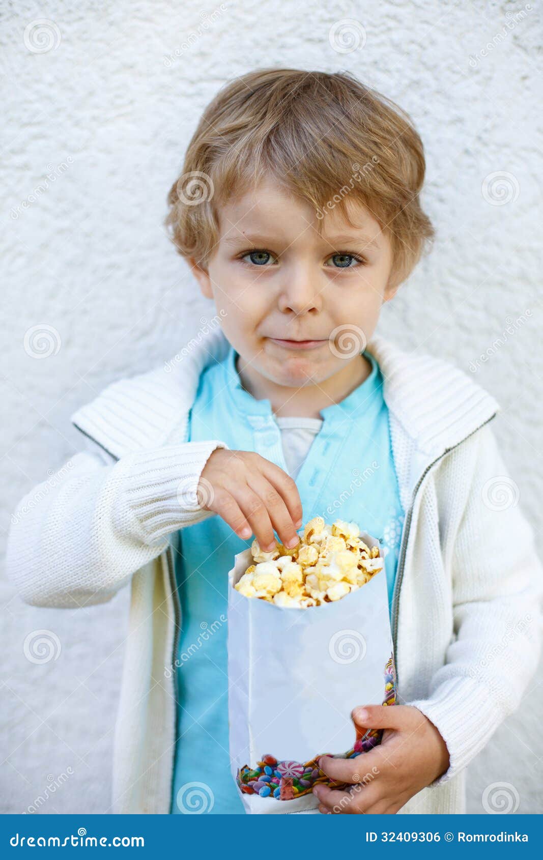Happy Little Boy with Popcorn Bag Stock Photo - Image of adorable ...
