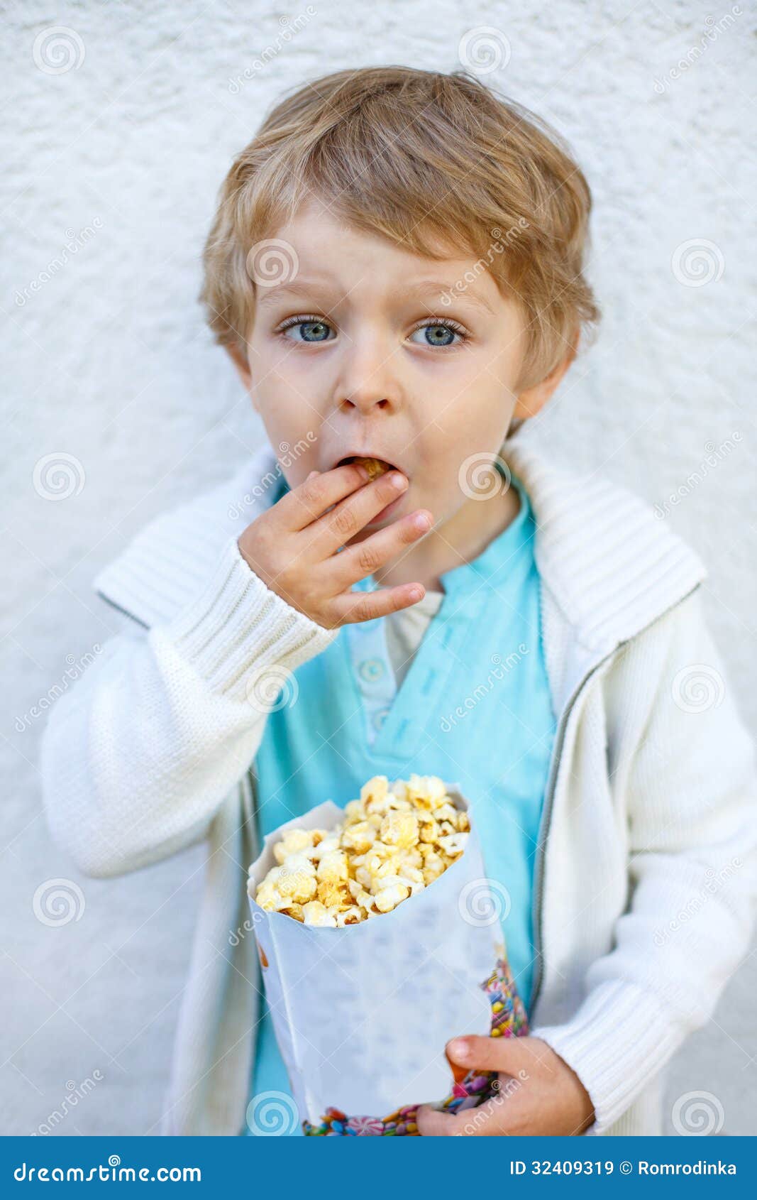 Happy Little Boy with Popcorn Bag Stock Image - Image of joyful, smile ...