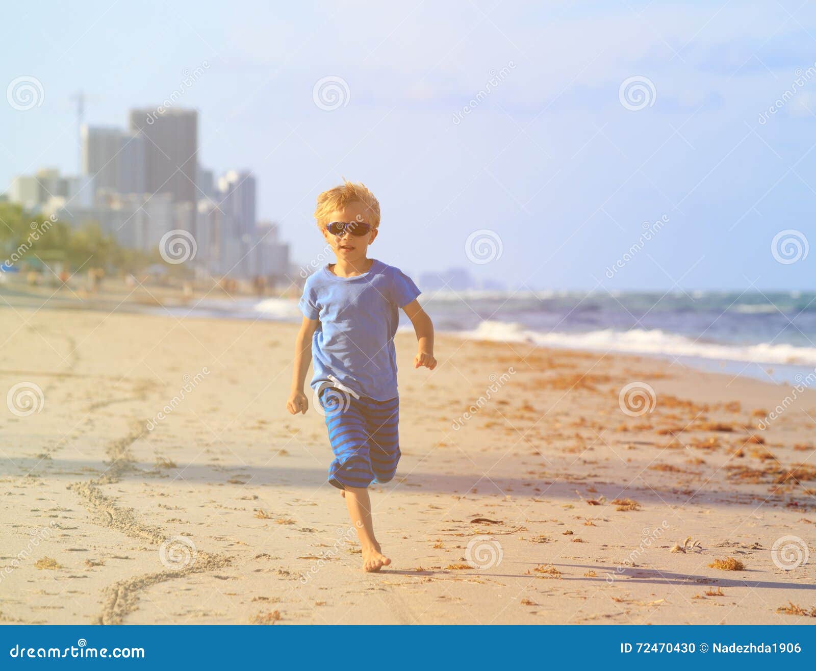 Happy Little Boy Running on Beach Stock Photo - Image of family, baby ...