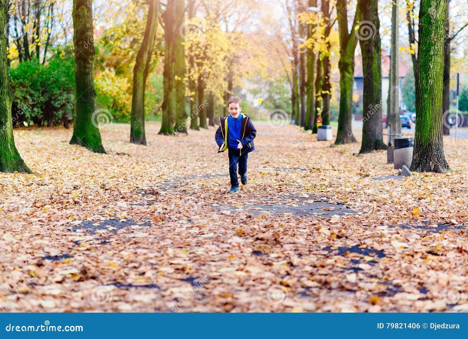 Happy little boy running stock photo. Image of expression - 79821406