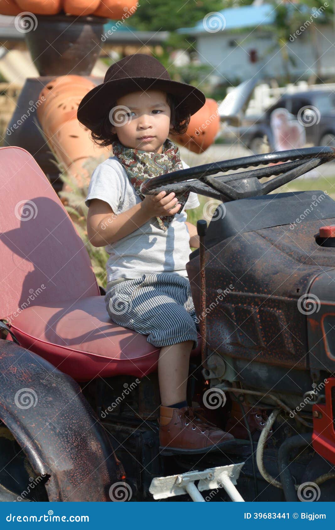 Happy Little Boy of Two Years Having Fun on Tractor in Summer Stock ...
