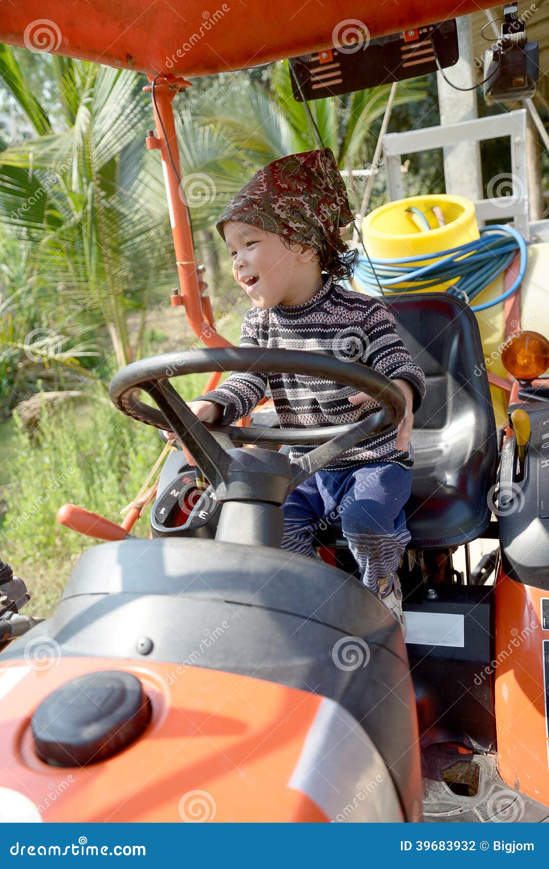 Happy Little Boy of Two Years Having Fun on Tractor in Summer Stock ...