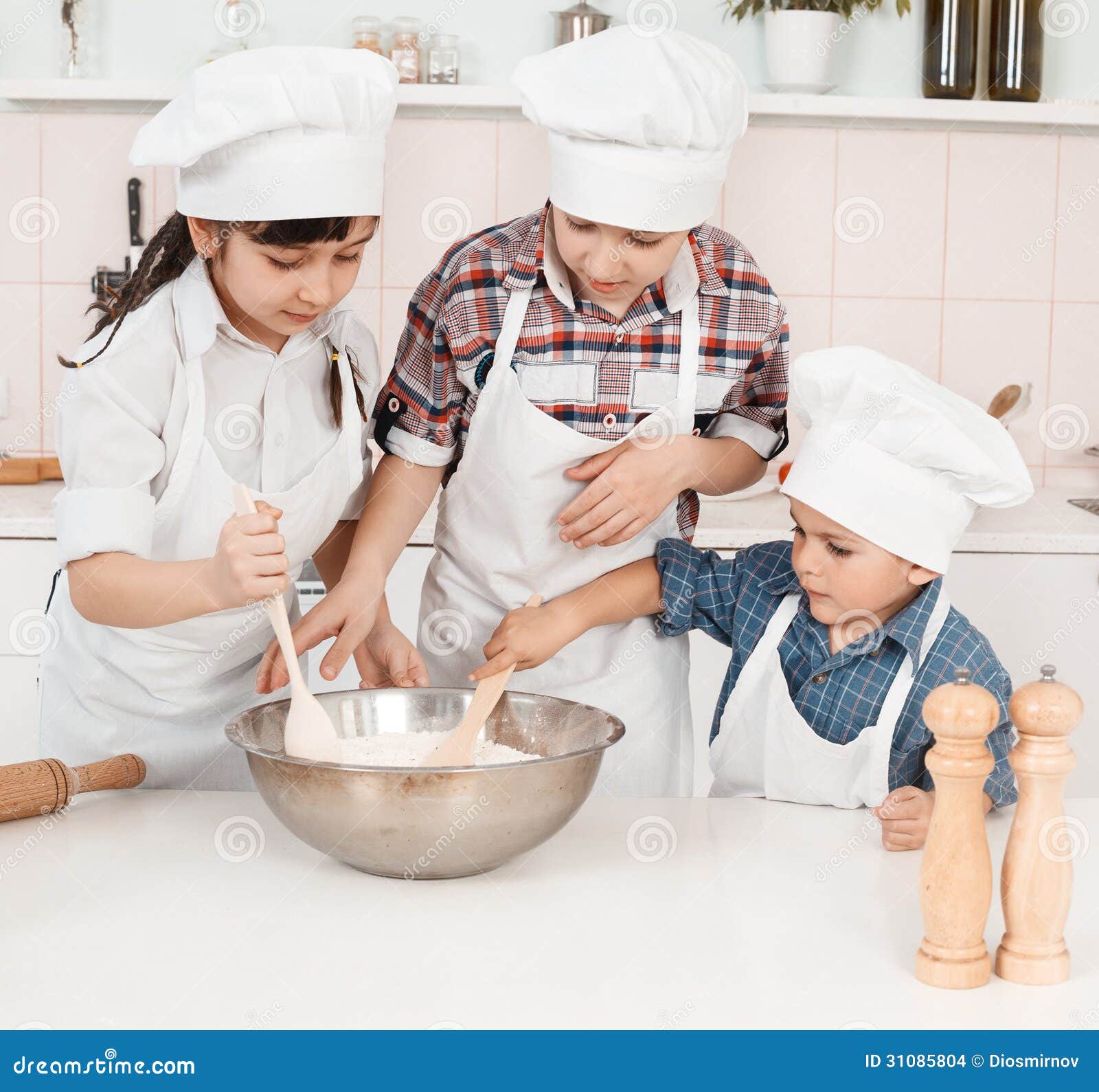 Happy Little Chefs Preparing Dough in the Kitchen Stock Photo - Image ...
