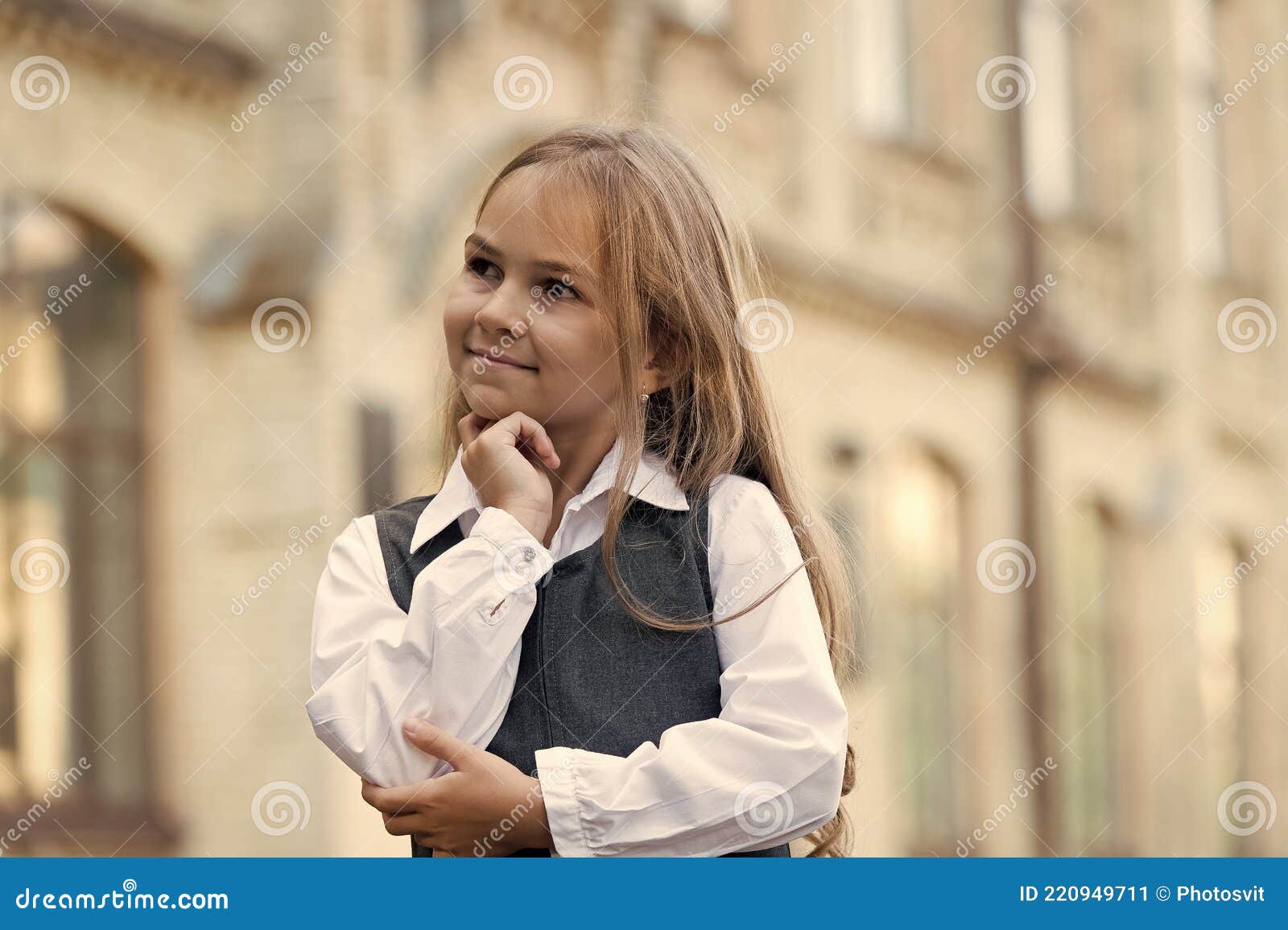 Happy Little Child Lost in Thoughts with Thoughtful Look in School ... Happy Little Child Lost in Thoughts with Thoughtful Look in School ...