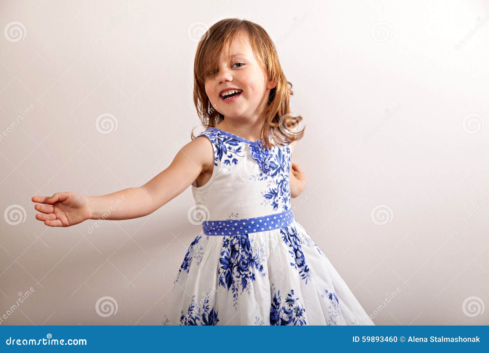 Happy little girl dancing stock photo. Image of finger - 59893460