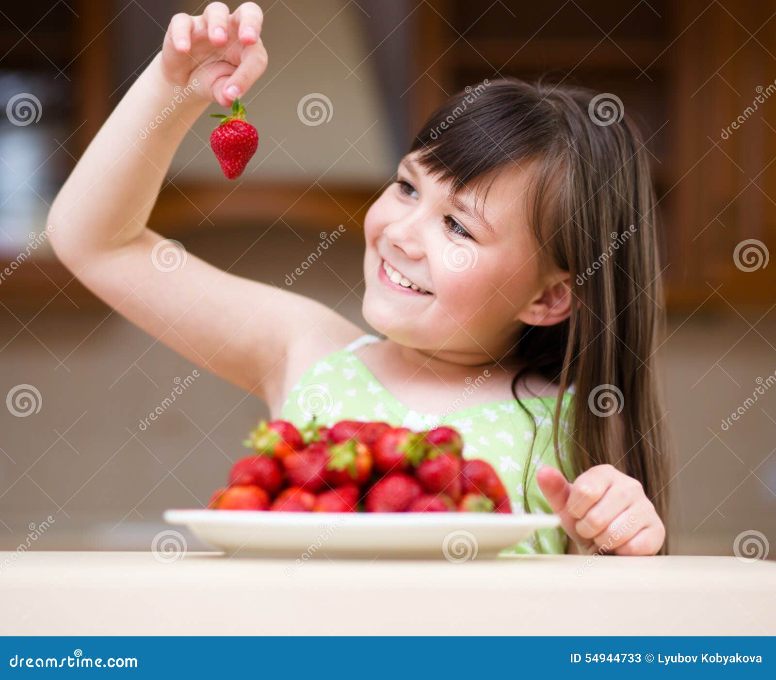 Happy Little Girl is Eating Strawberries Stock Image - Image of beauty ...