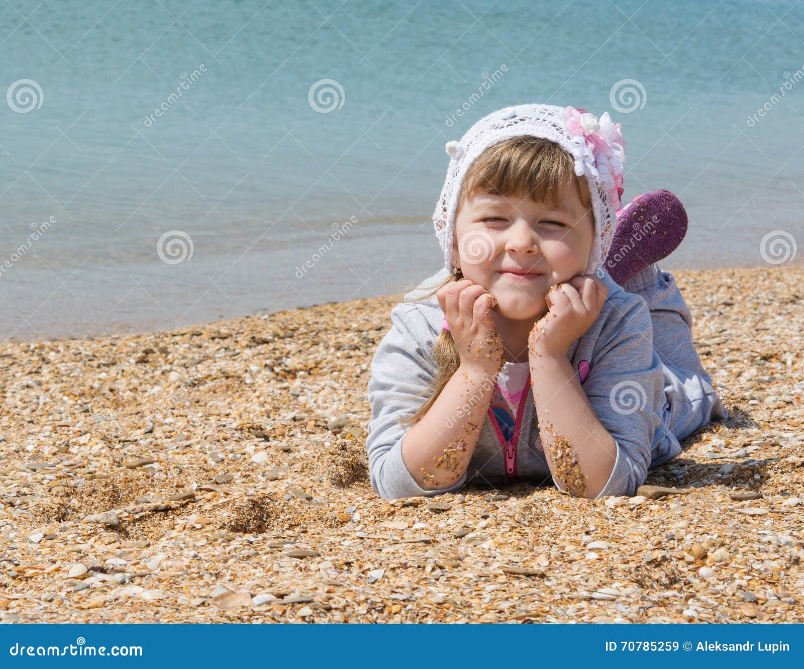 Happy little girl stock image. Image of travel, shells - 70785259