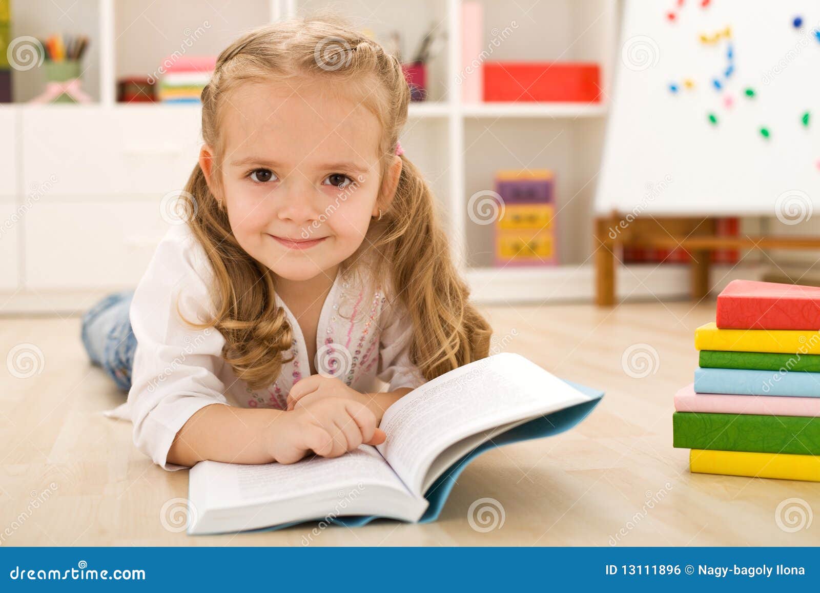 Happy Little Girl Practicing Reading Stock Photo - Image of learning ...