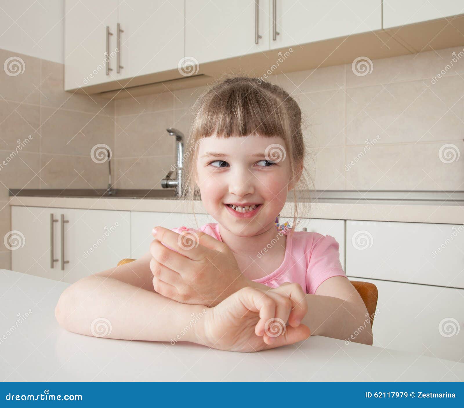 Happy Little Girl Sitting at Table Stock Image - Image of glad, sitting ...