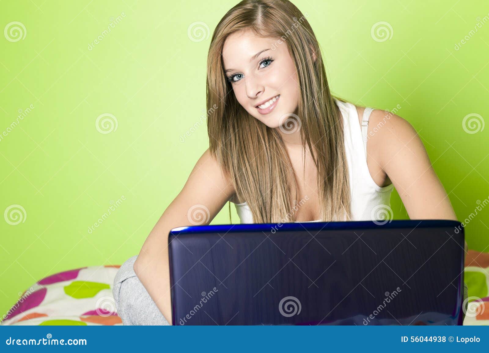 Happy Looking Teenage Girl Using a Computer Stock Photo - Image of ...
