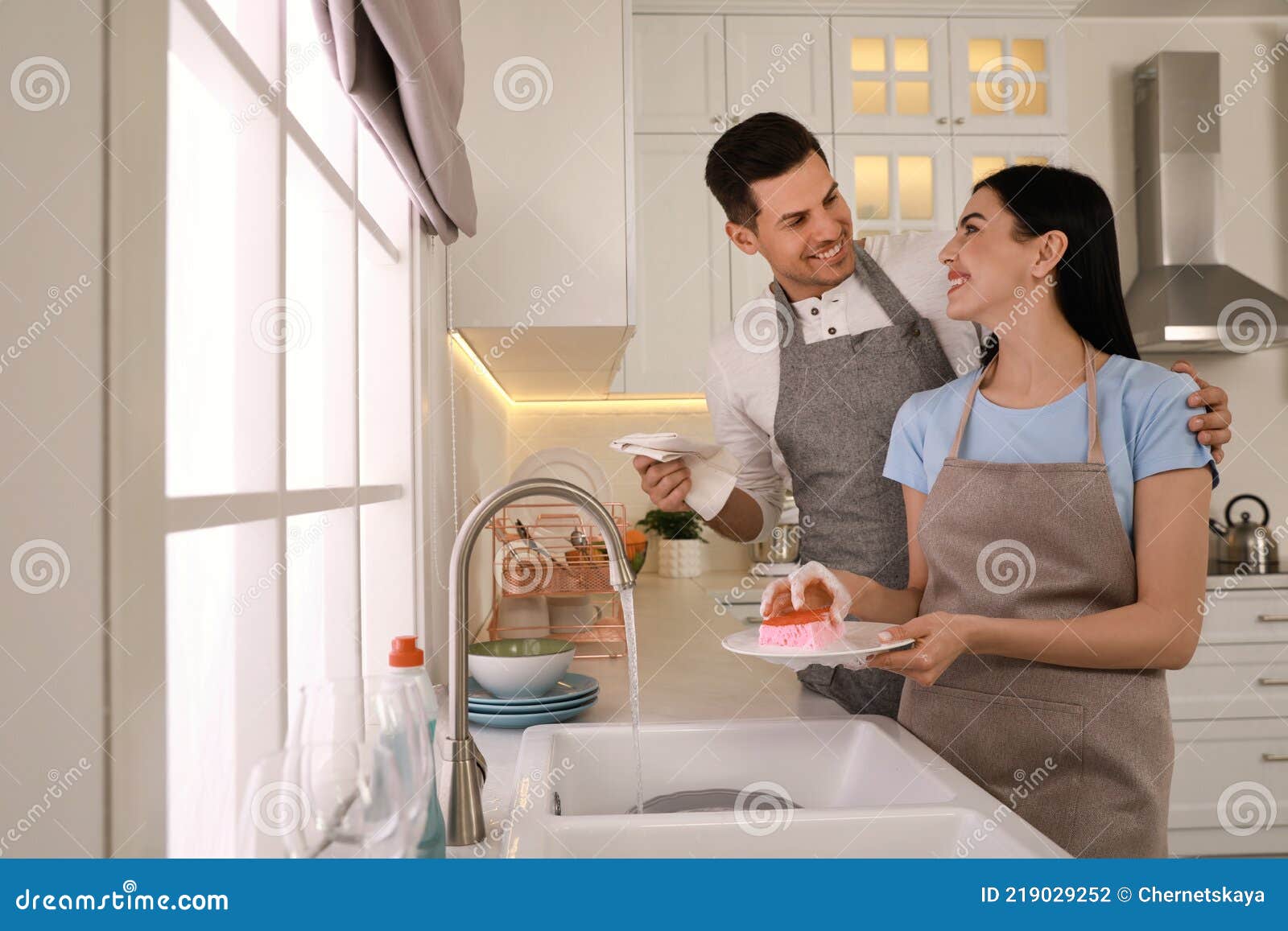 Happy Lovely Couple Washing Dishes in Kitchen Stock Photo - Image of ...