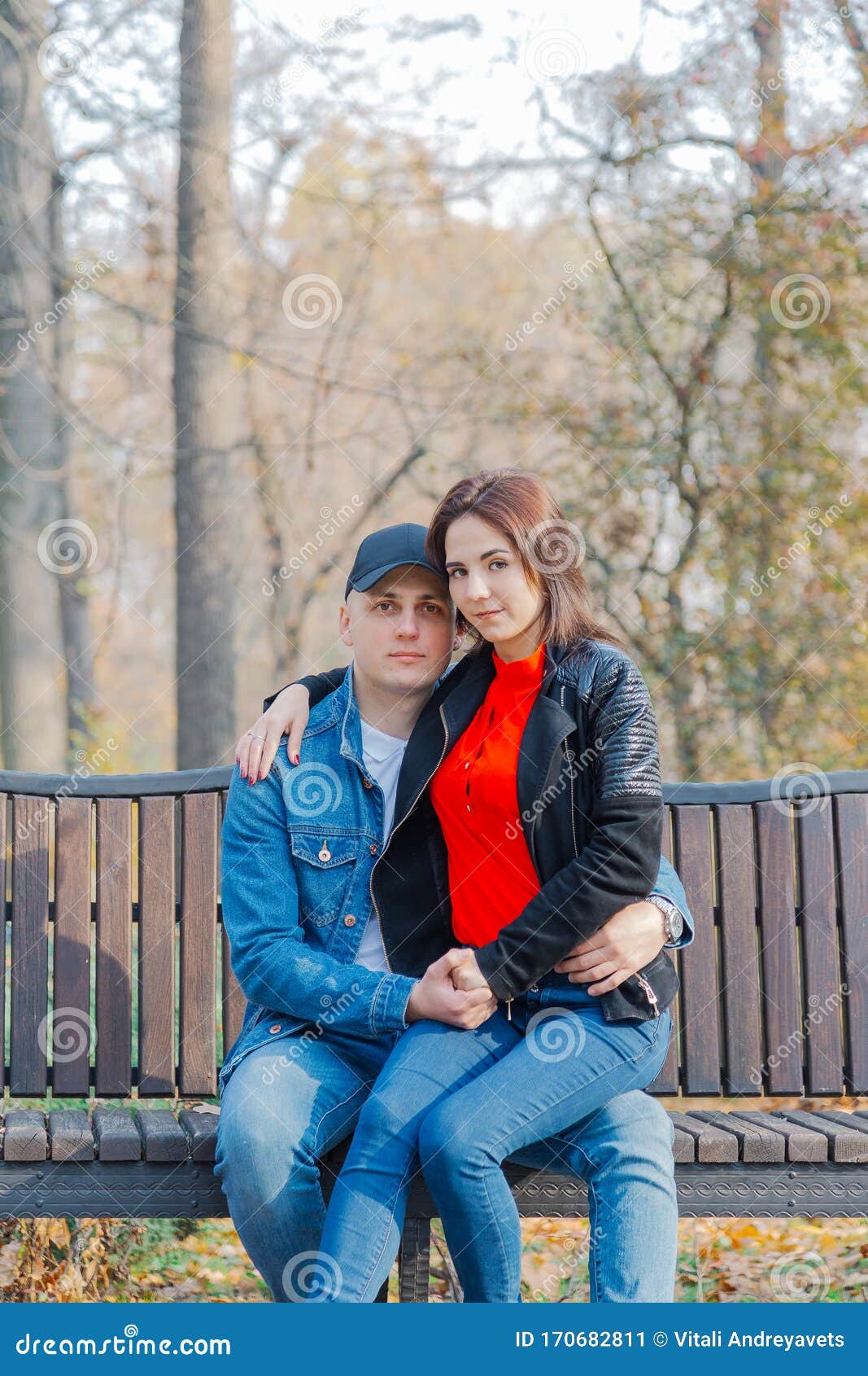 Happy Lovers in the Park on a Bench in Autumn. Stock Image - Image of ...