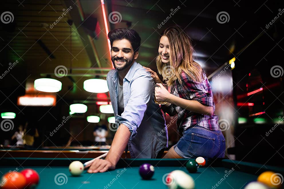 Happy Young Man Playing Snooker with His Girlfriend. Happy Loving ... Happy Young Man Playing Snooker with His Girlfriend. Happy Loving ...