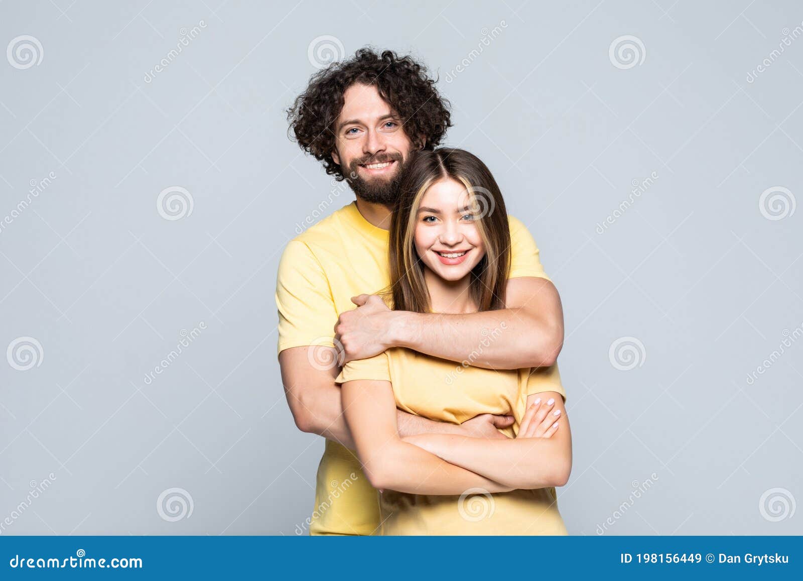 Happy Loving Couple Hugging Isolated Isolated on Gray Background Stock ...