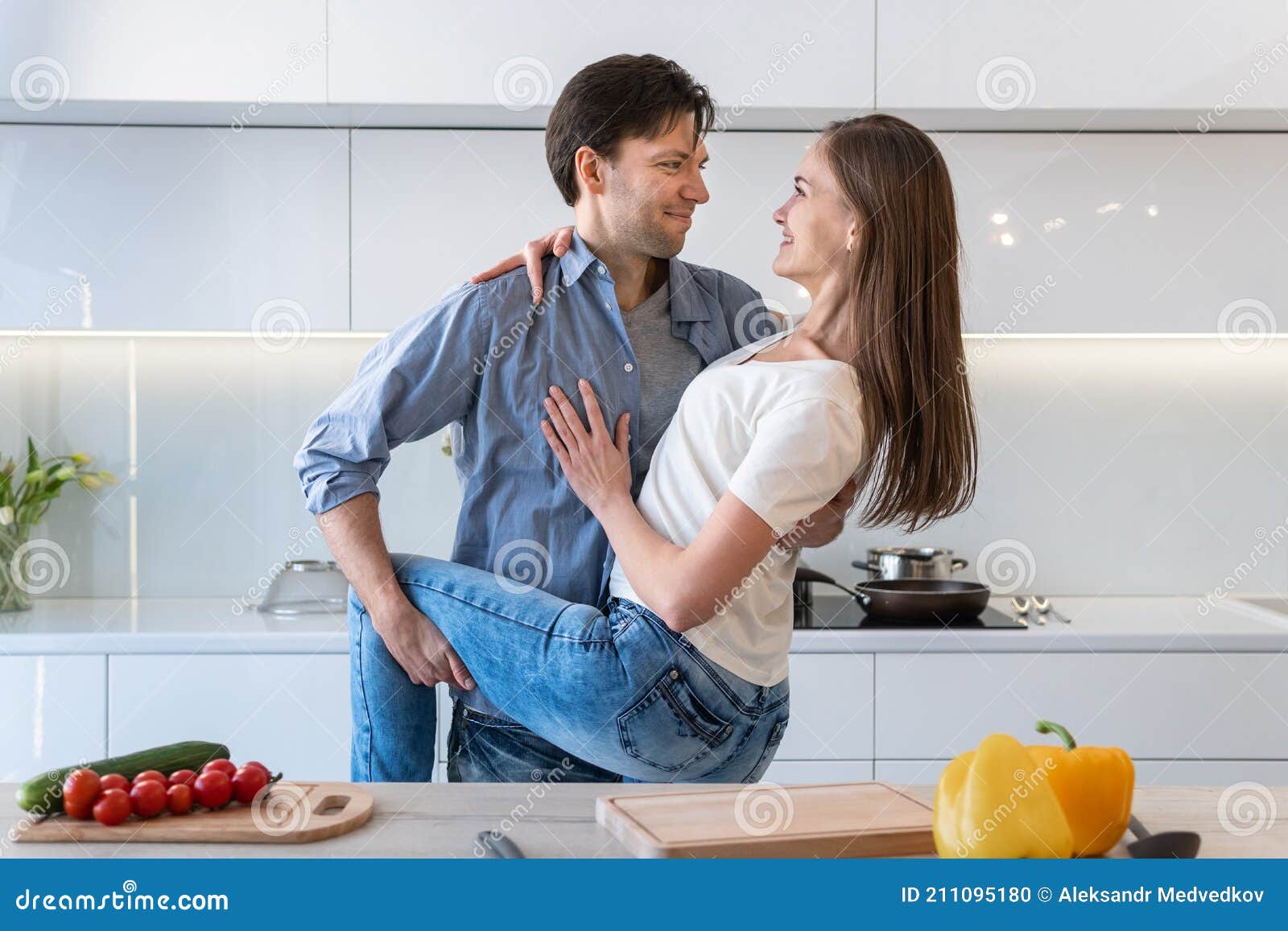 Cute Couple Hugging in the Kitchen Stock Photo - Image of hobby, female ...