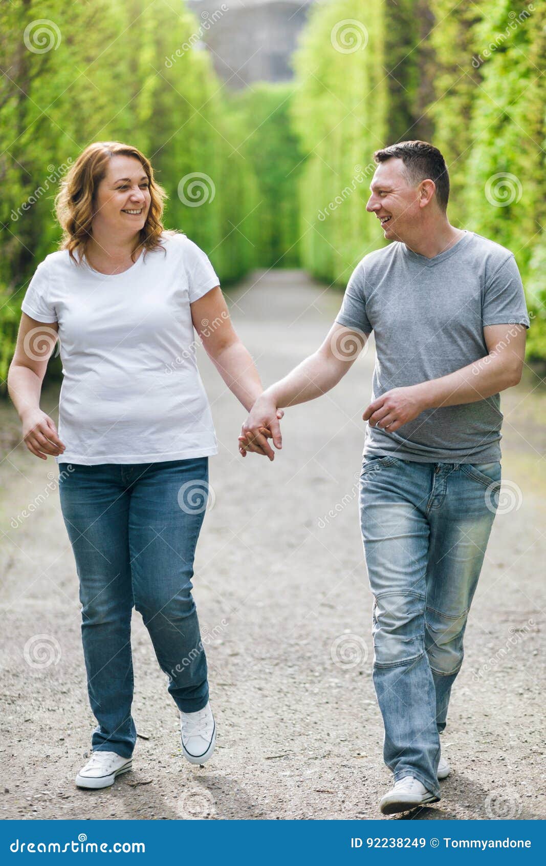 Happy Loving Couple on a Romantic Walk Outdoors in Park Stock Image ...