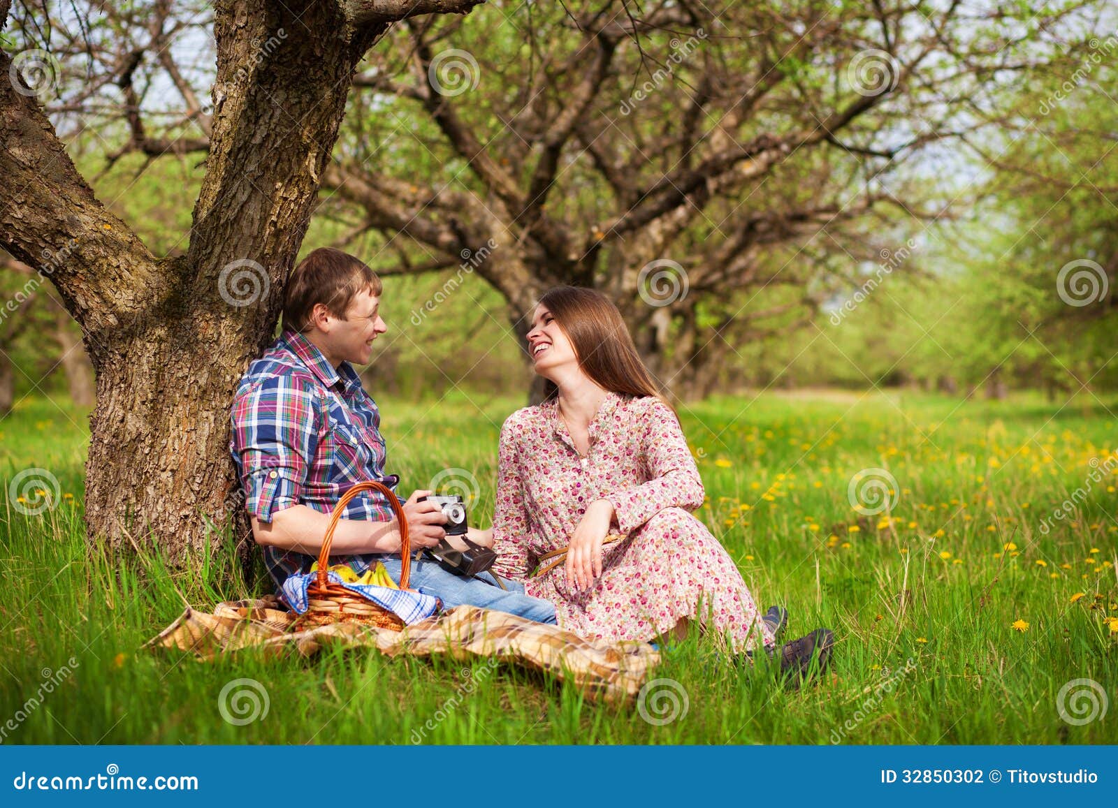 Happy Loving Couple on a Spring Meadow Stock Photo - Image of together ...