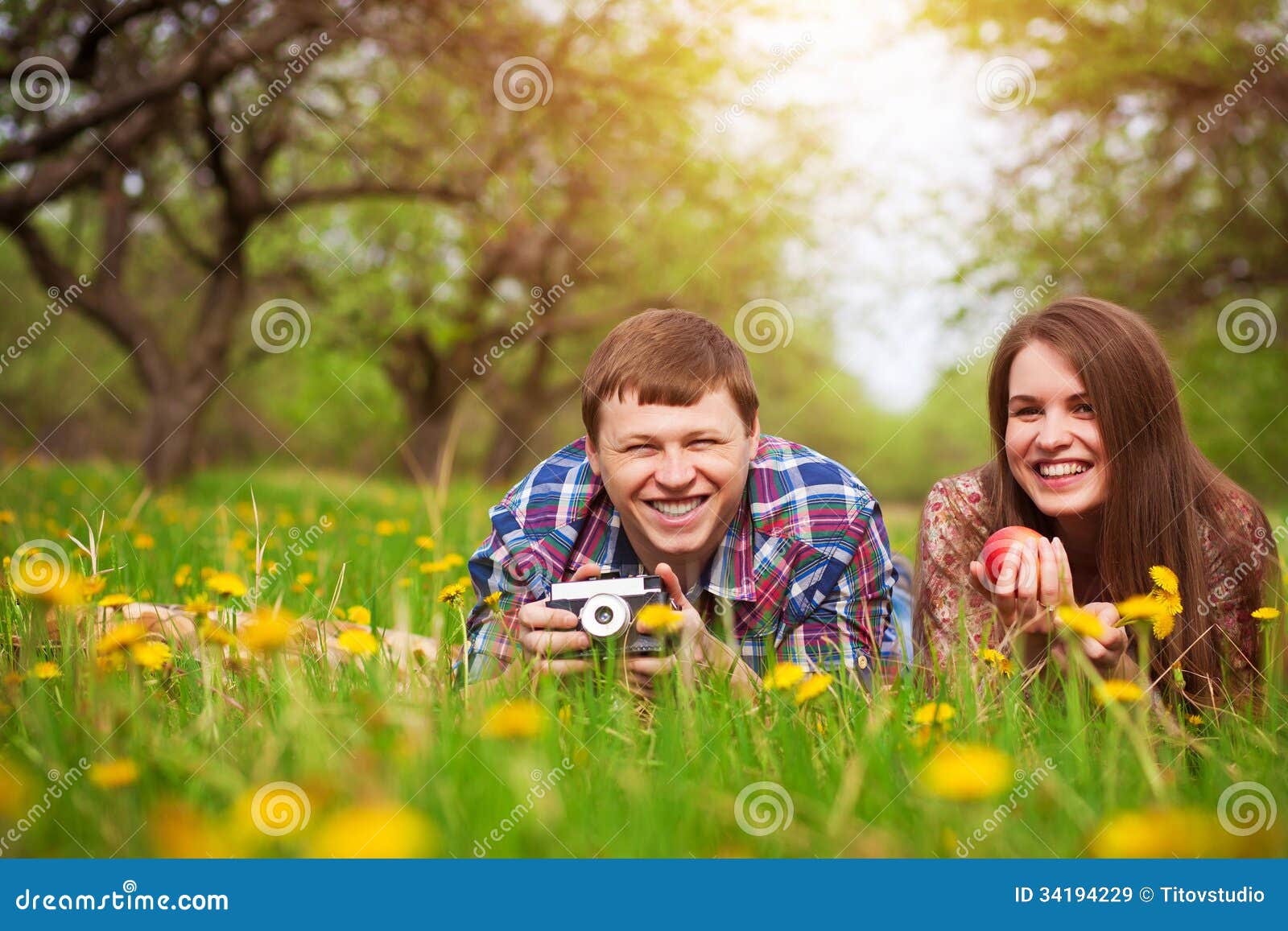 Happy Loving Couple on a Spring Meadow Stock Image - Image of playful ...