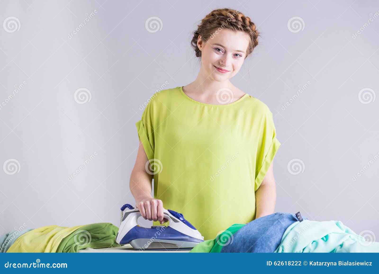Happy Maid Doing the Ironing Stock Photo - Image of caucasian, work ...