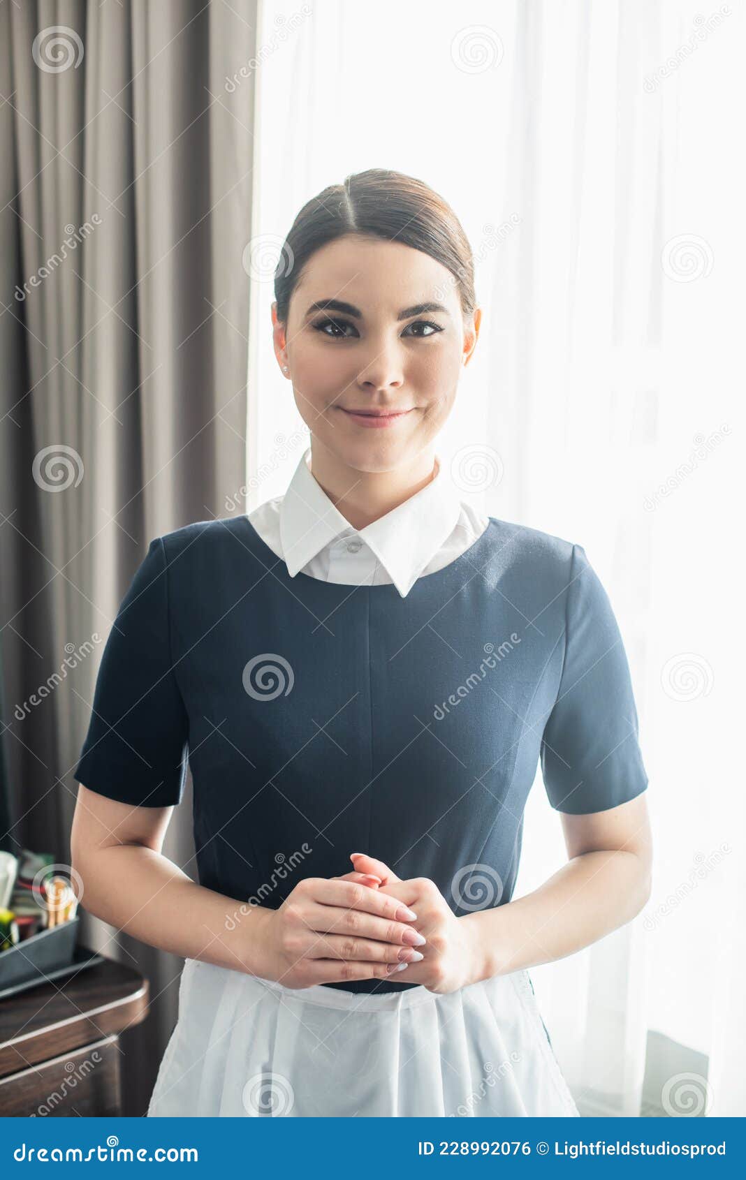 Happy Maid in Uniform Smiling in Stock Photo - Image of professional ...