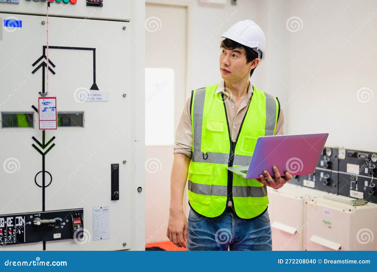 Happy Maintenance Engineer Checking and Maintaining Solar Panels System ...