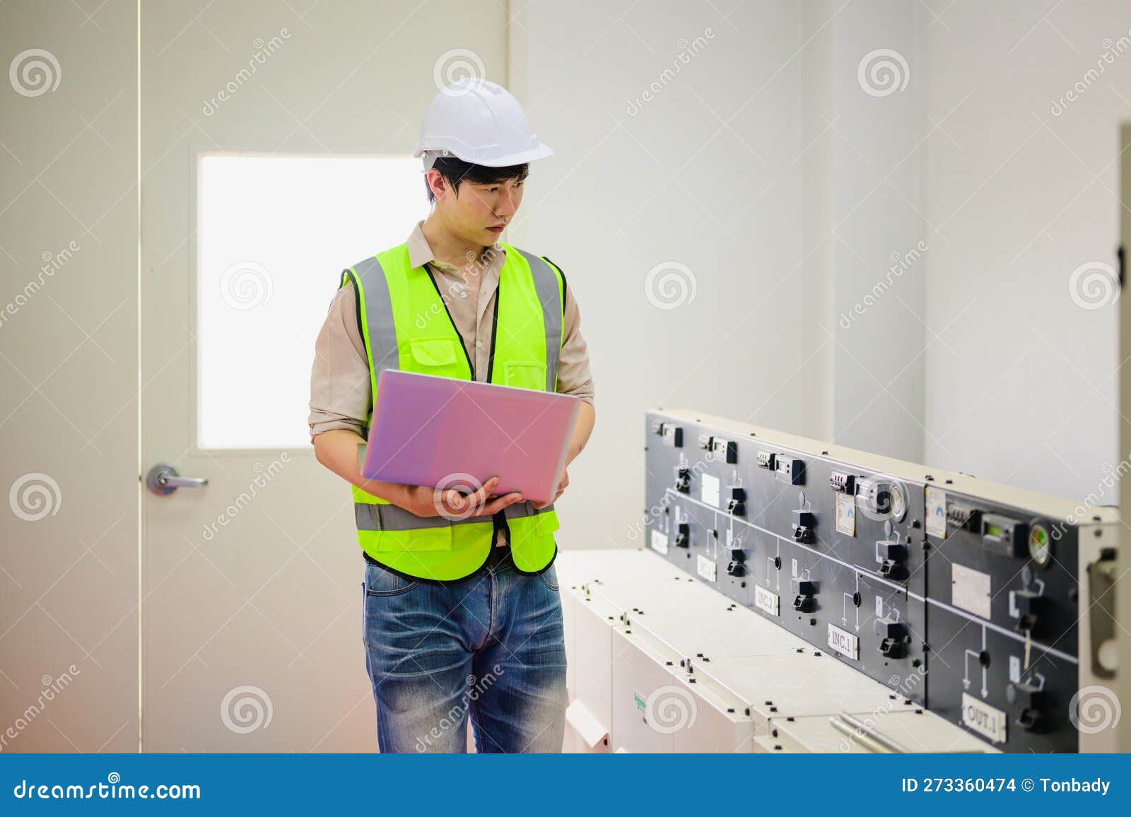 Happy Maintenance Engineer Checking and Maintaining Solar Panels Stock ...