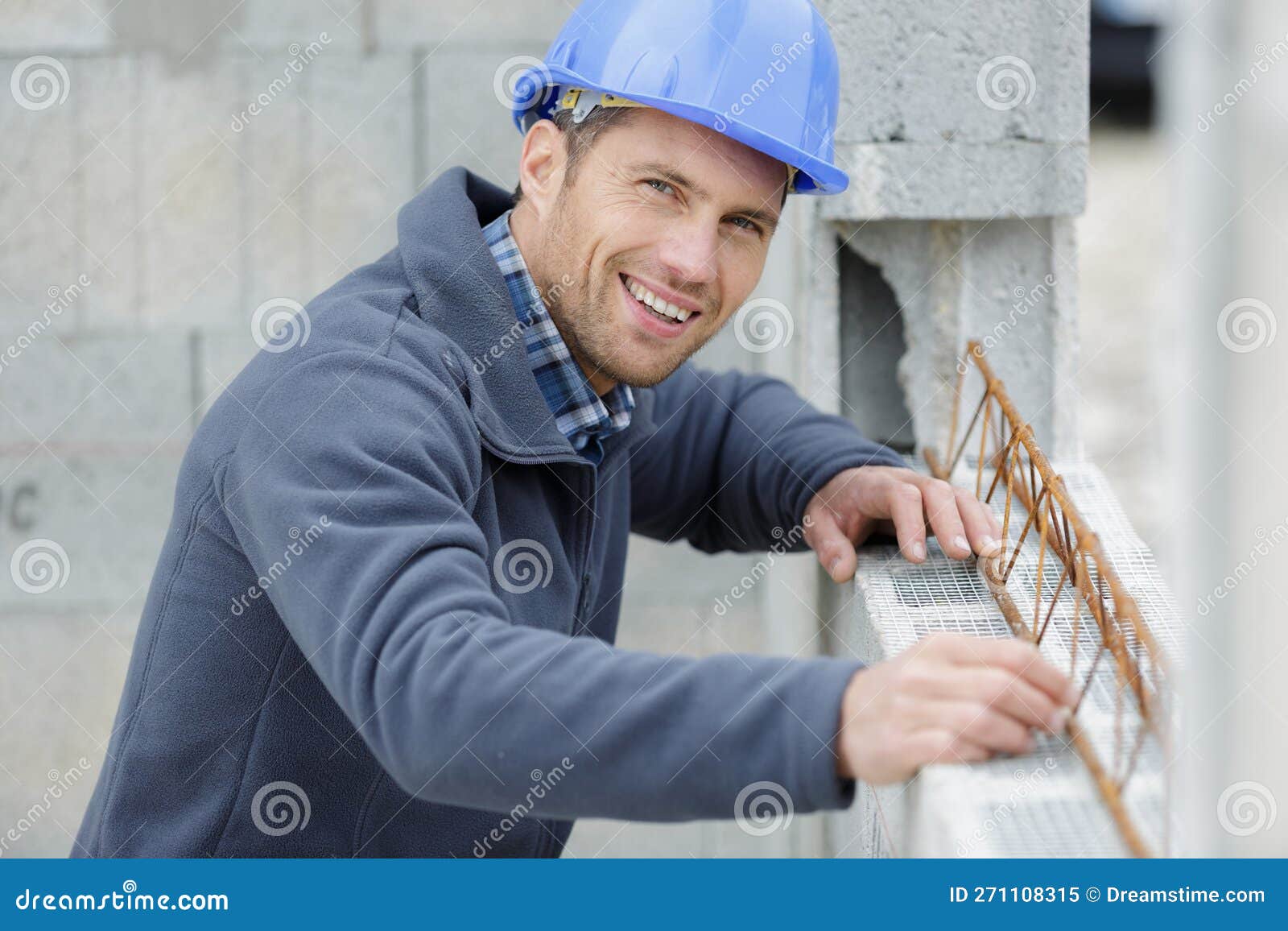 Happy male builder at work stock image. Image of stone - 271108315