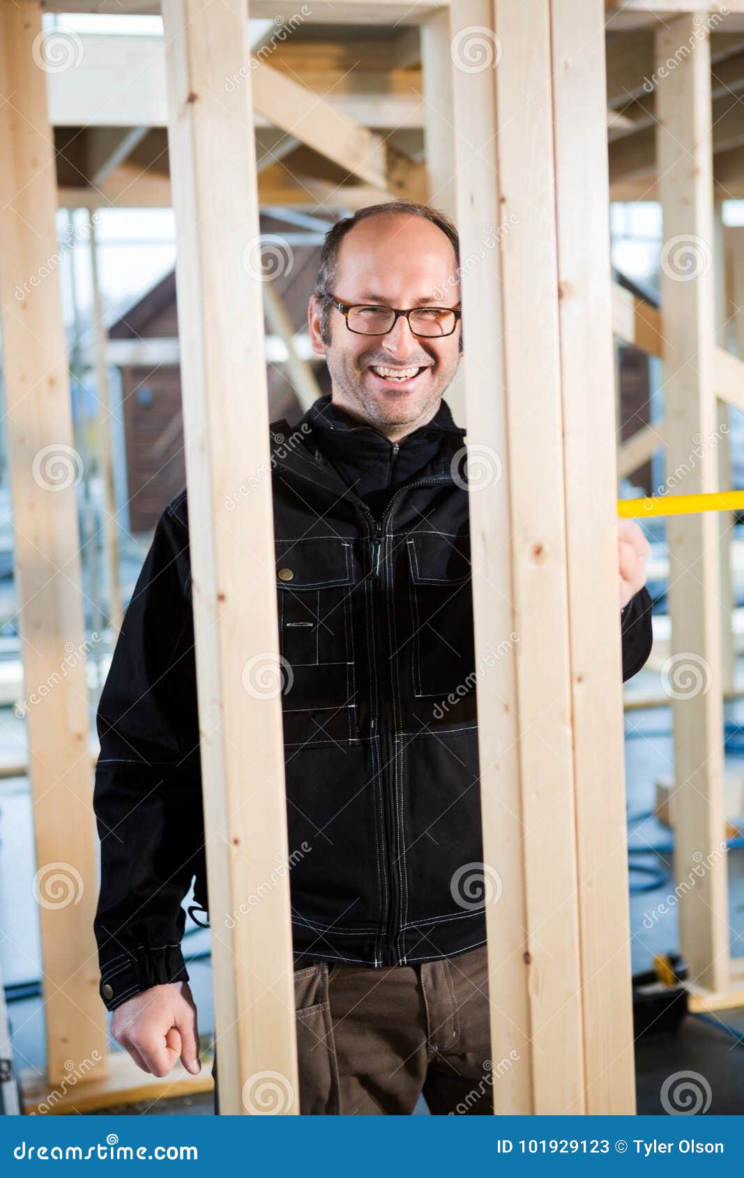 Happy Male Carpenter Working at Construction Site Stock Image - Image ...