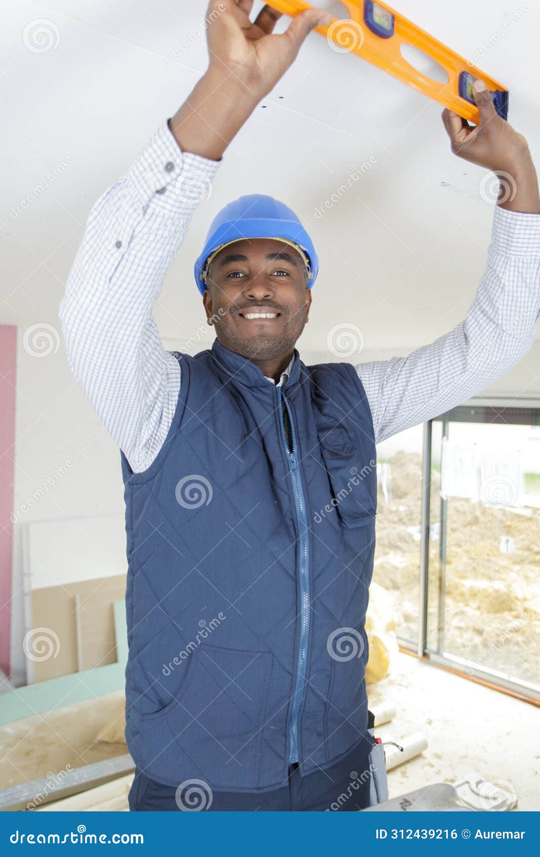 Happy Male Construction Worker Adjusting Ceiling Stock Photo - Image of ...