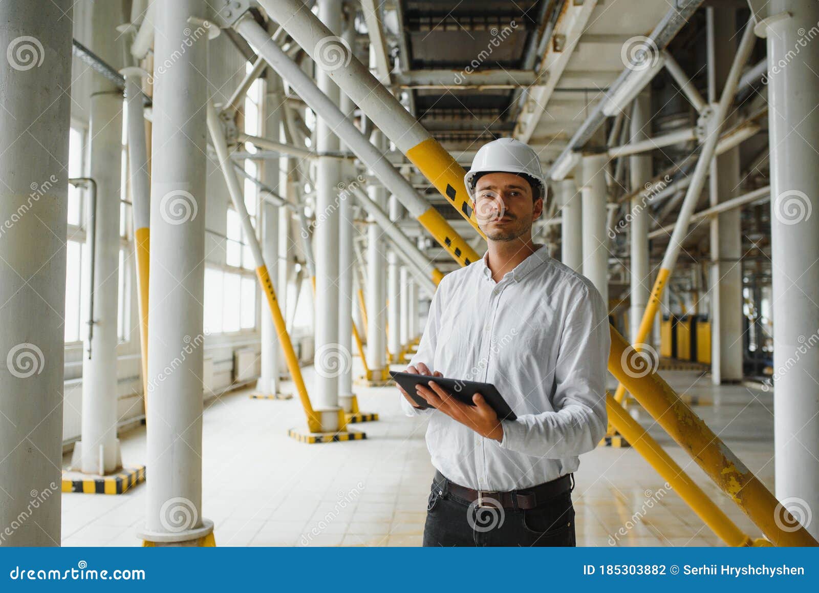 Happy Male Industrial Technician Inside a Factory Stock Photo - Image ...