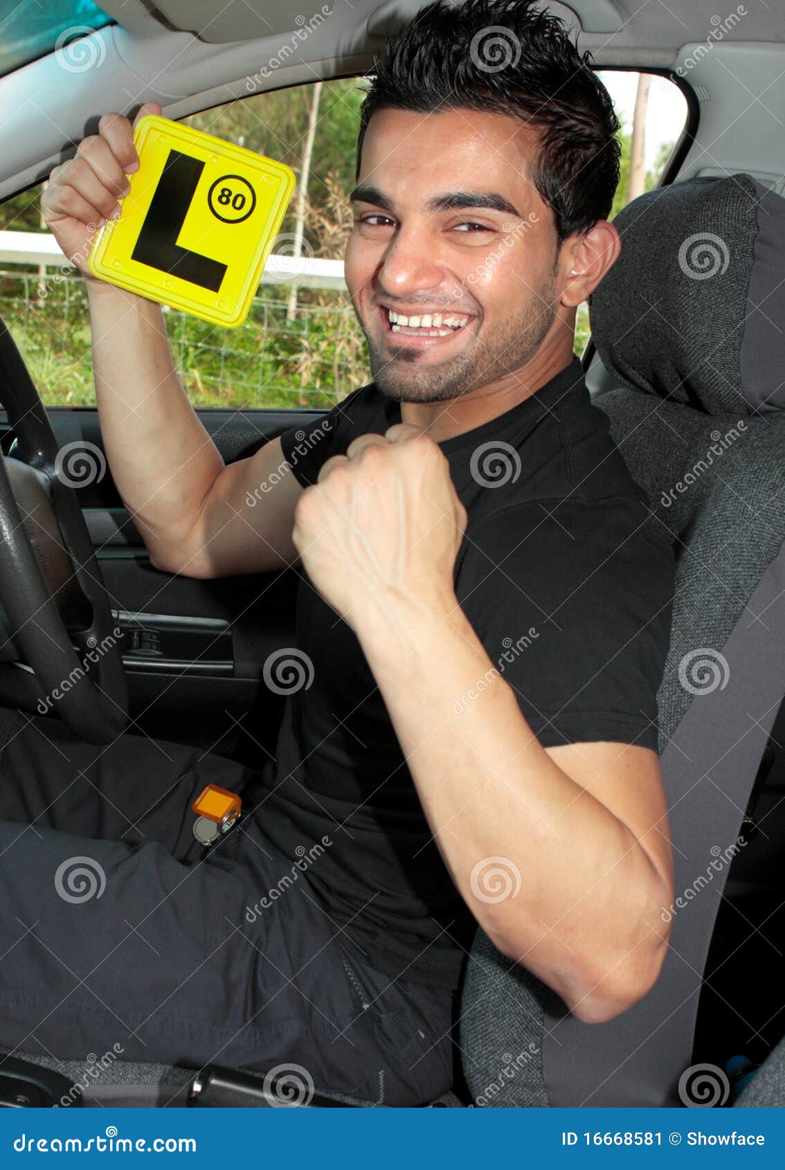 Happy male learner driver stock image. Image of licence - 16668581