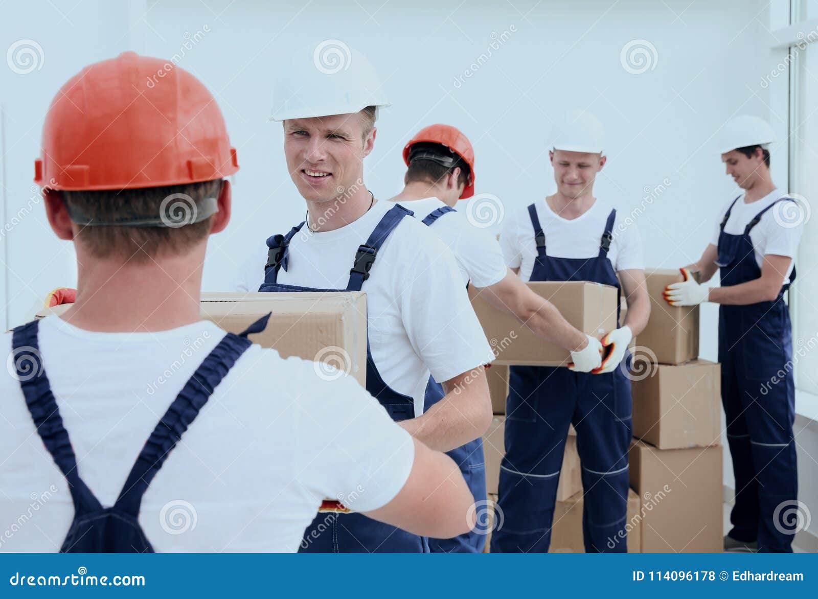 Group of People Builders with Boxes Stock Photo - Image of packing ...