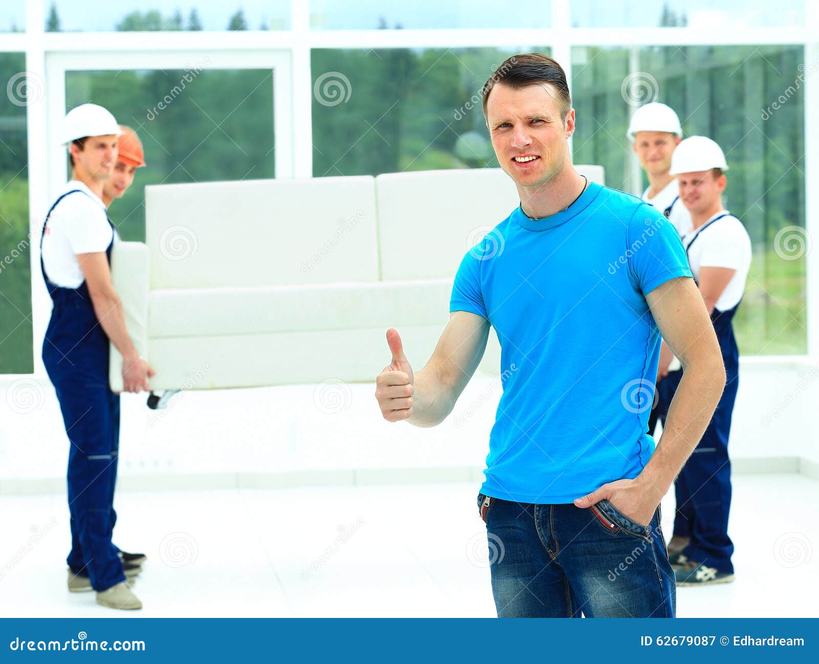 Happy Male Movers in Uniform Carrying Stock Image - Image of delivery ...