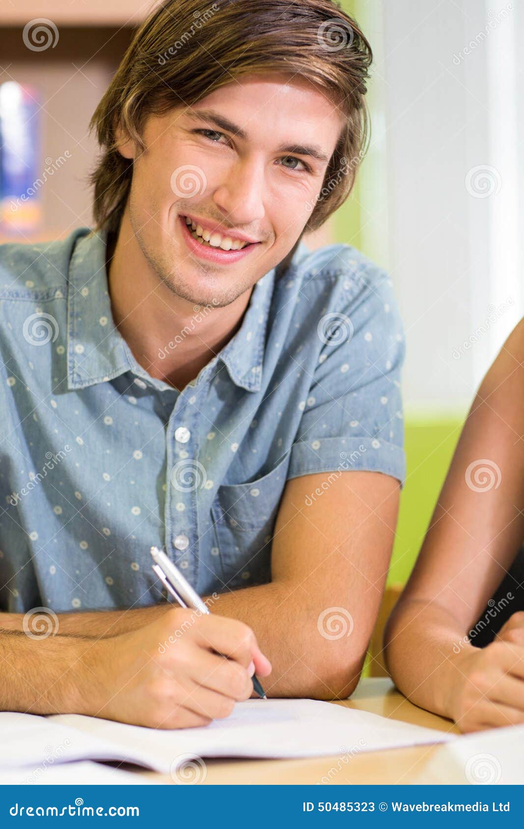 Happy Male Student Doing Homework in Library Stock Image - Image of ...