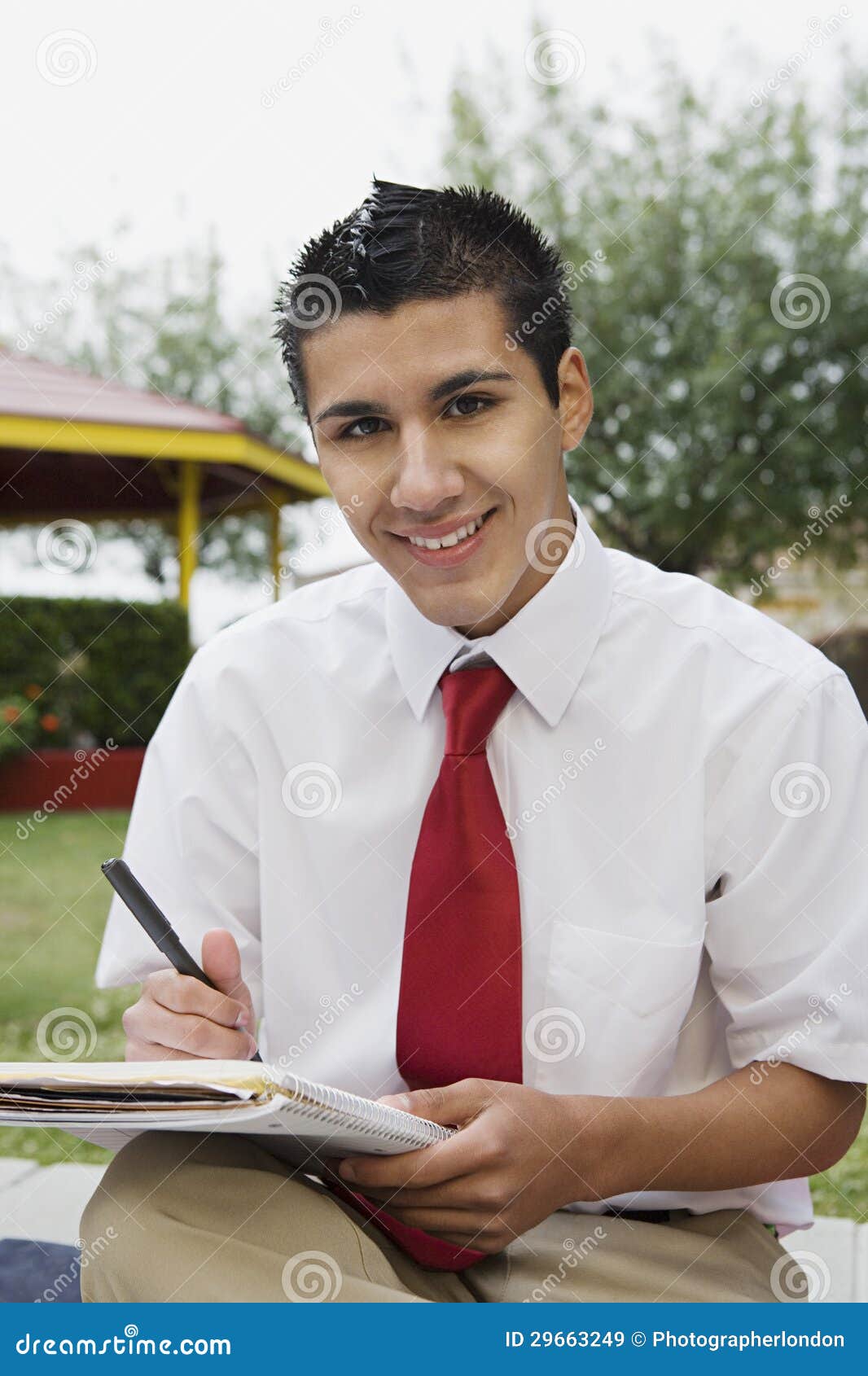 Happy Male Student Writing Notes Stock Image - Image of male, people ...