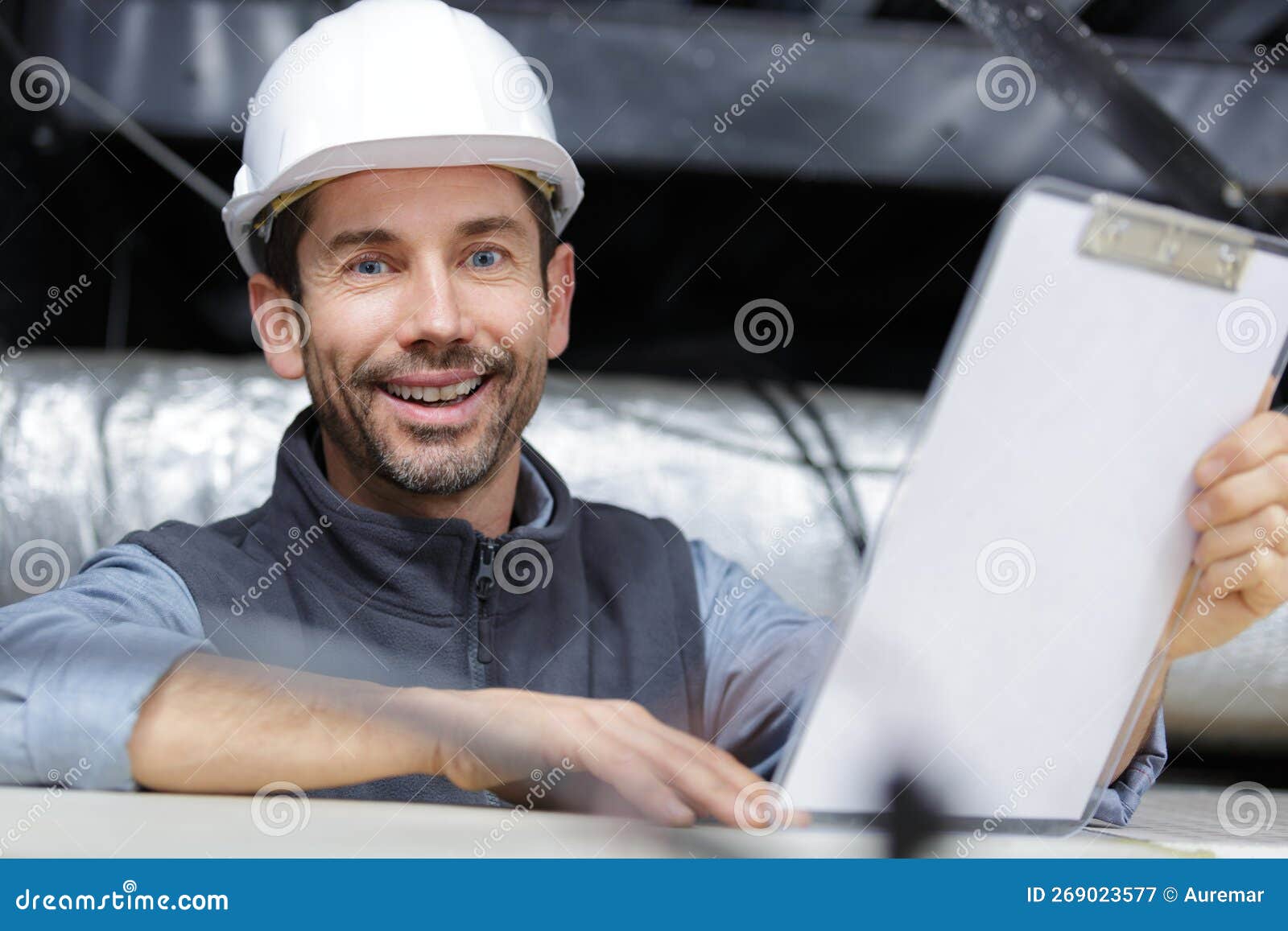 Happy Male Worker Holding Clipboard Stock Image - Image of background ...