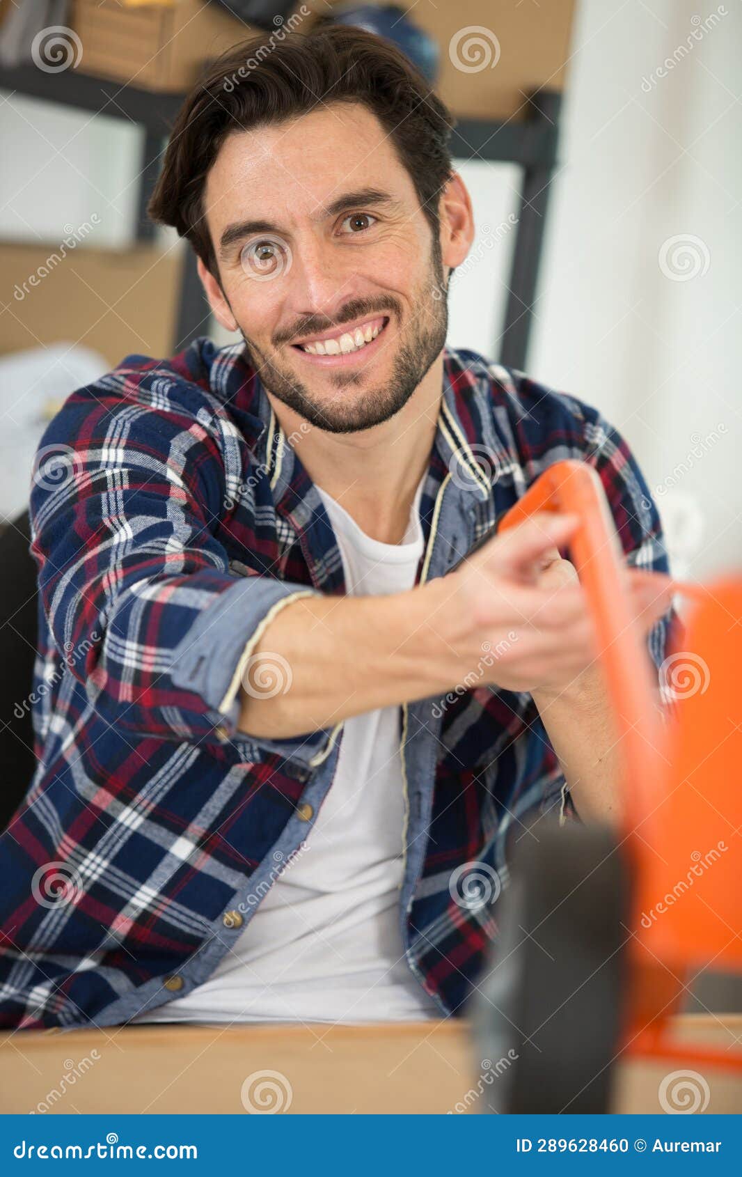 Happy Male Worker Smiling at Camera Stock Photo - Image of warehouse ...
