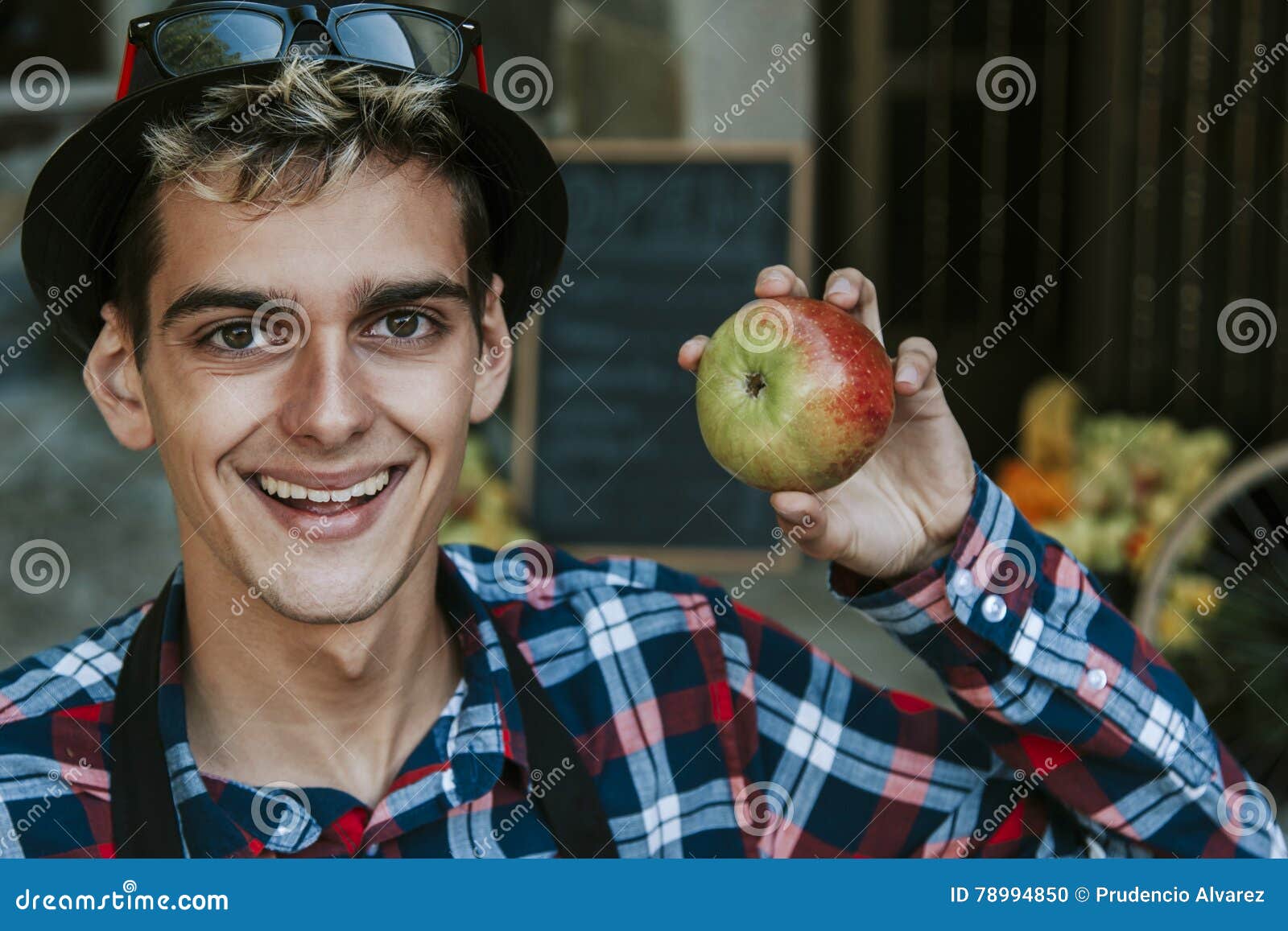 Happy man with apple stock photo. Image of lifestyle - 78994850