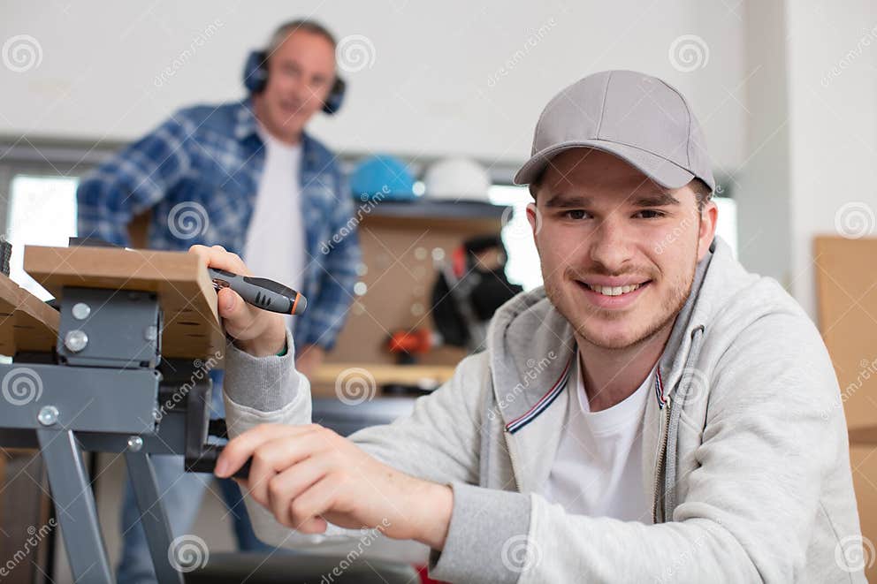 Happy Man As Craftsman Apprentice Stock Photo - Image of work, safety: 276721906