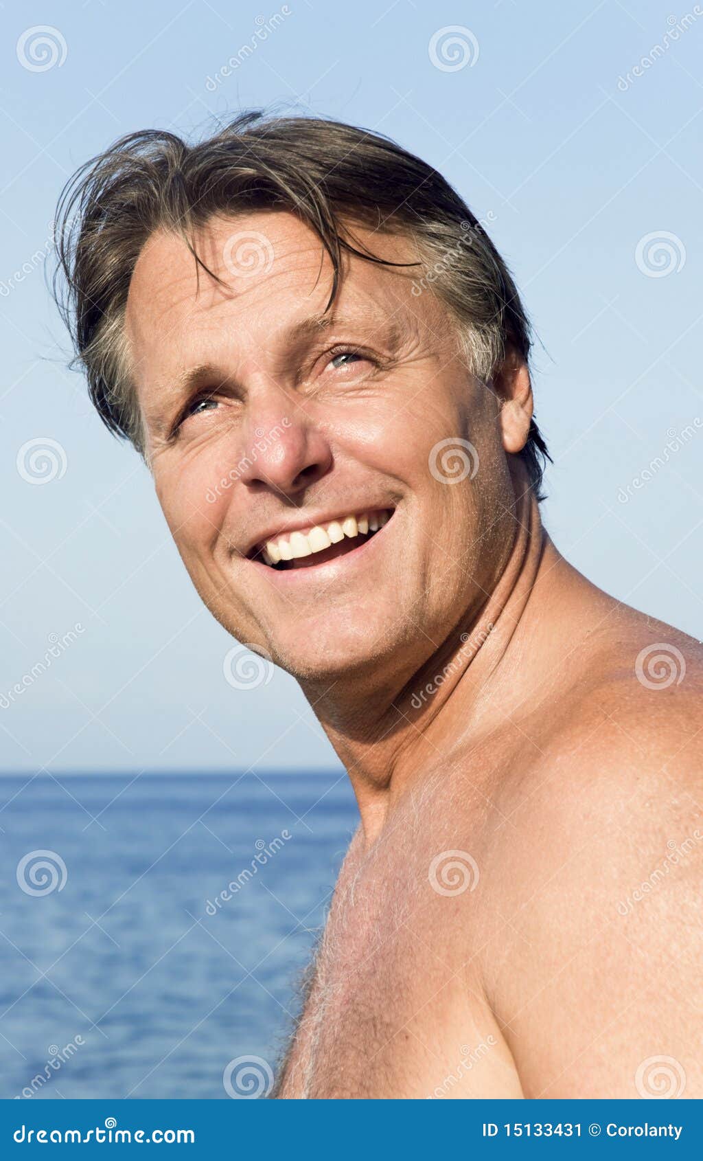 Happy man on the beach stock image. Image of camera, gorgeous - 15133431