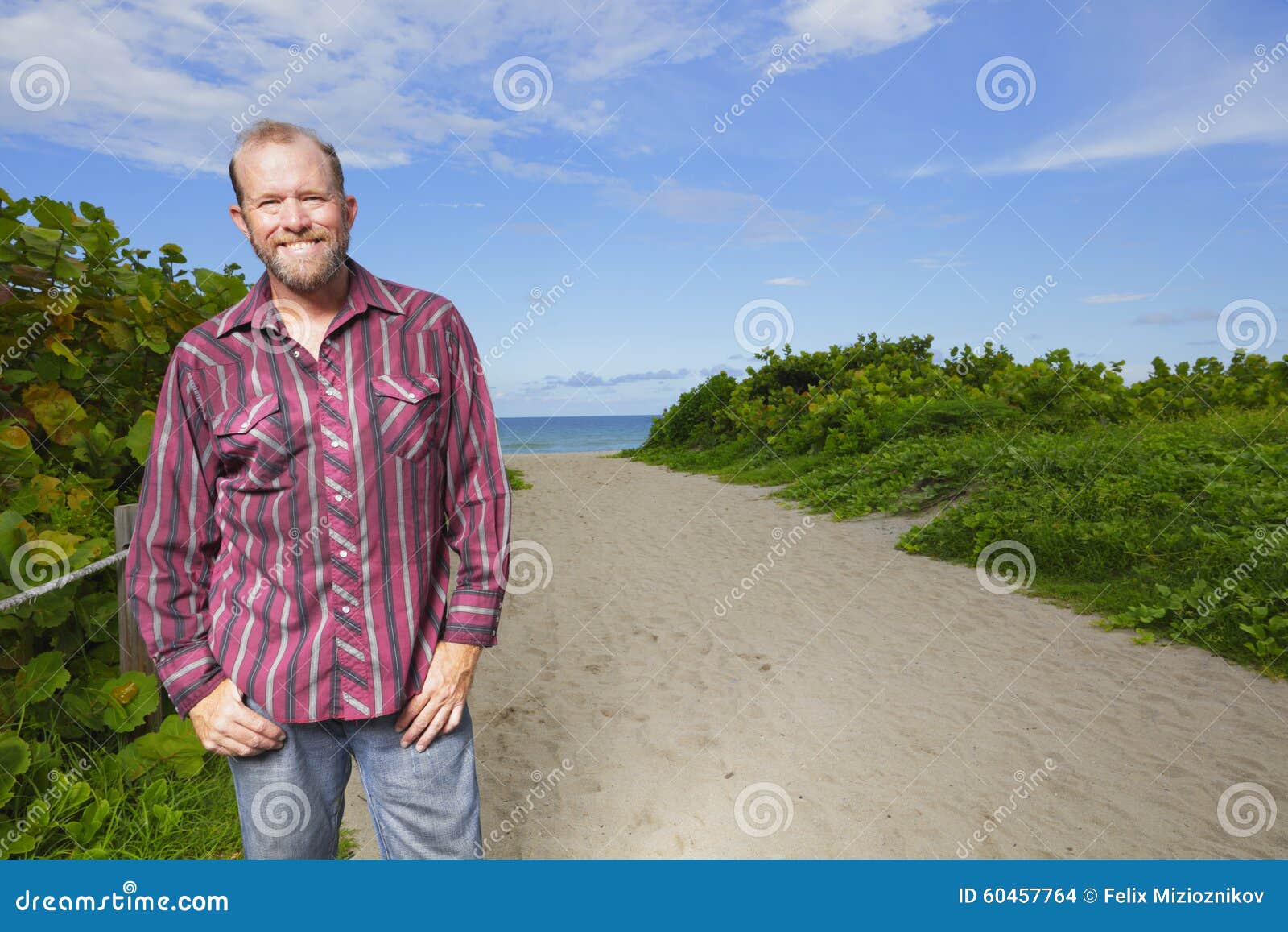 Happy man at the beach stock photo. Image of dunes, button - 60457764