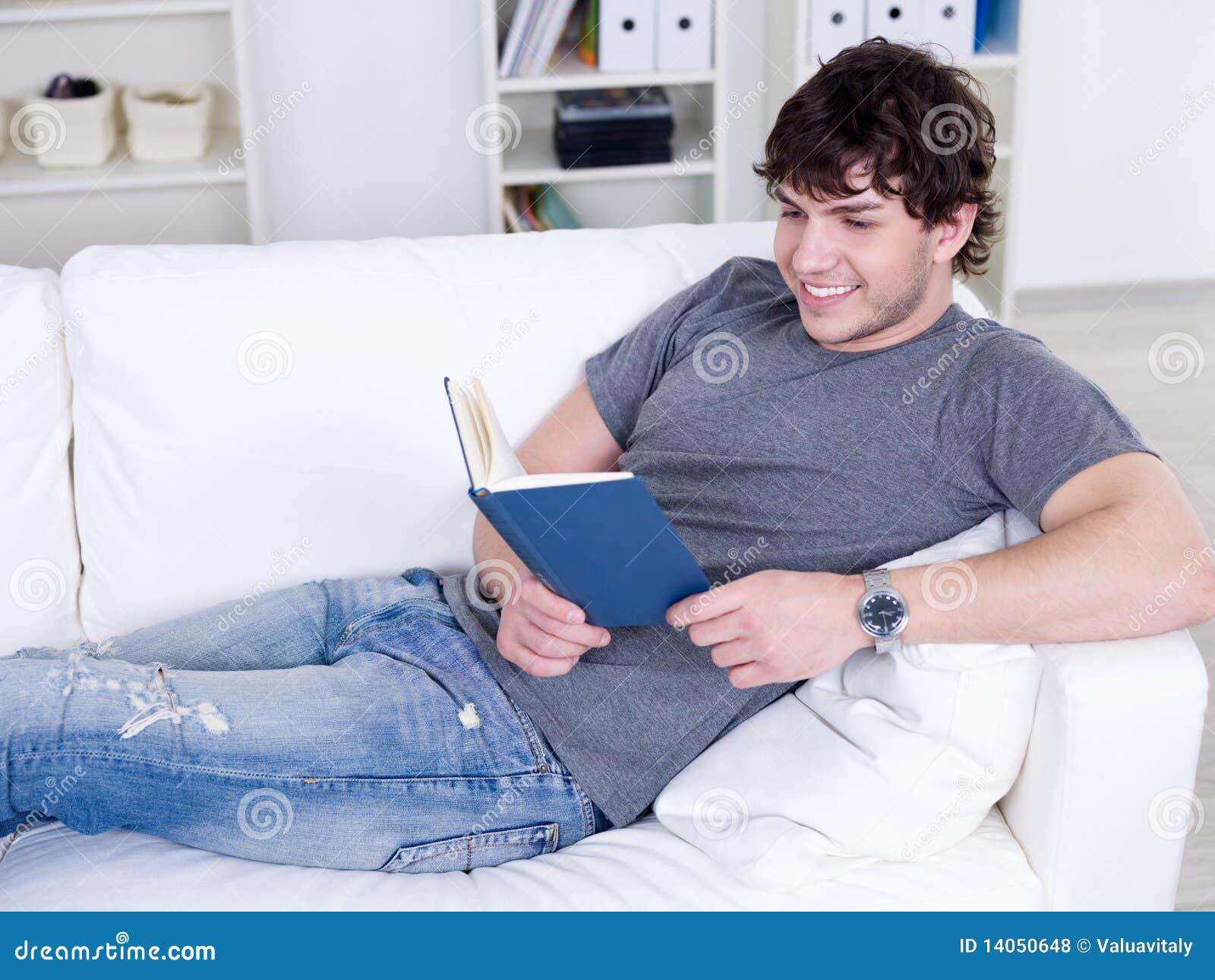 Happy man with book stock photo. Image of read, indoors - 14050648