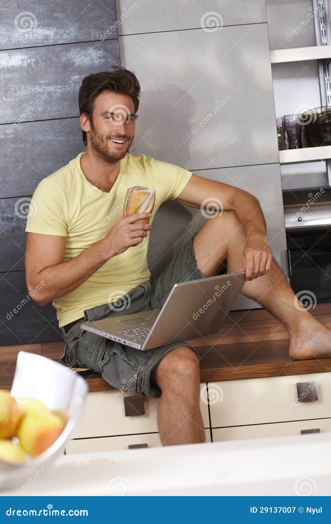 Happy Man Browsing Internet in Kitchen Stock Image - Image of color ...