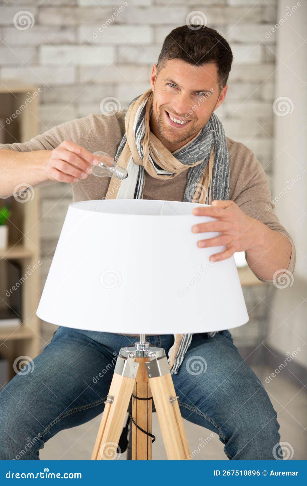 Happy Man Changing Light Bulb Stock Photo - Image of ladder, people ...