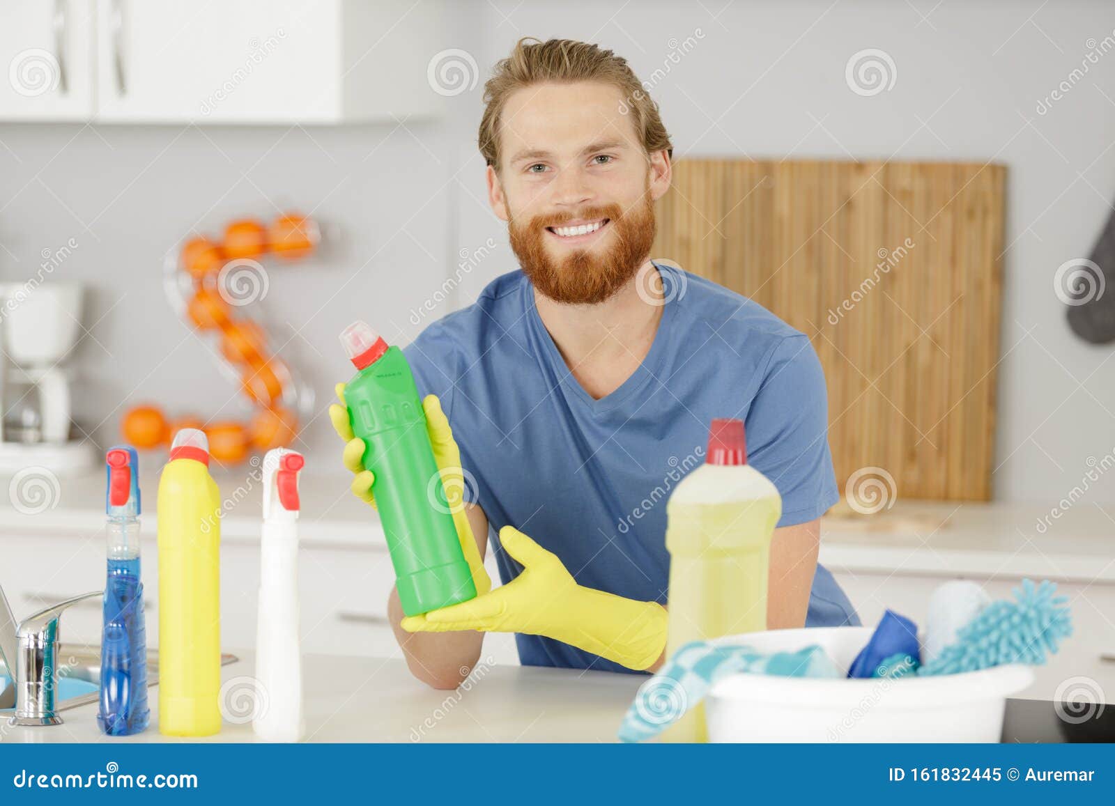 Happy Man Cleans with Cleaning Products Stock Image - Image of ...