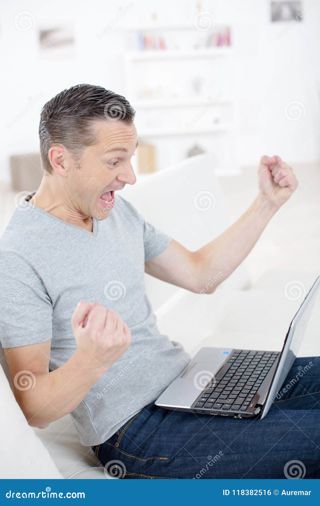 Happy Man Completed Task and Triumphing with Raised Hands Stock Photo ...