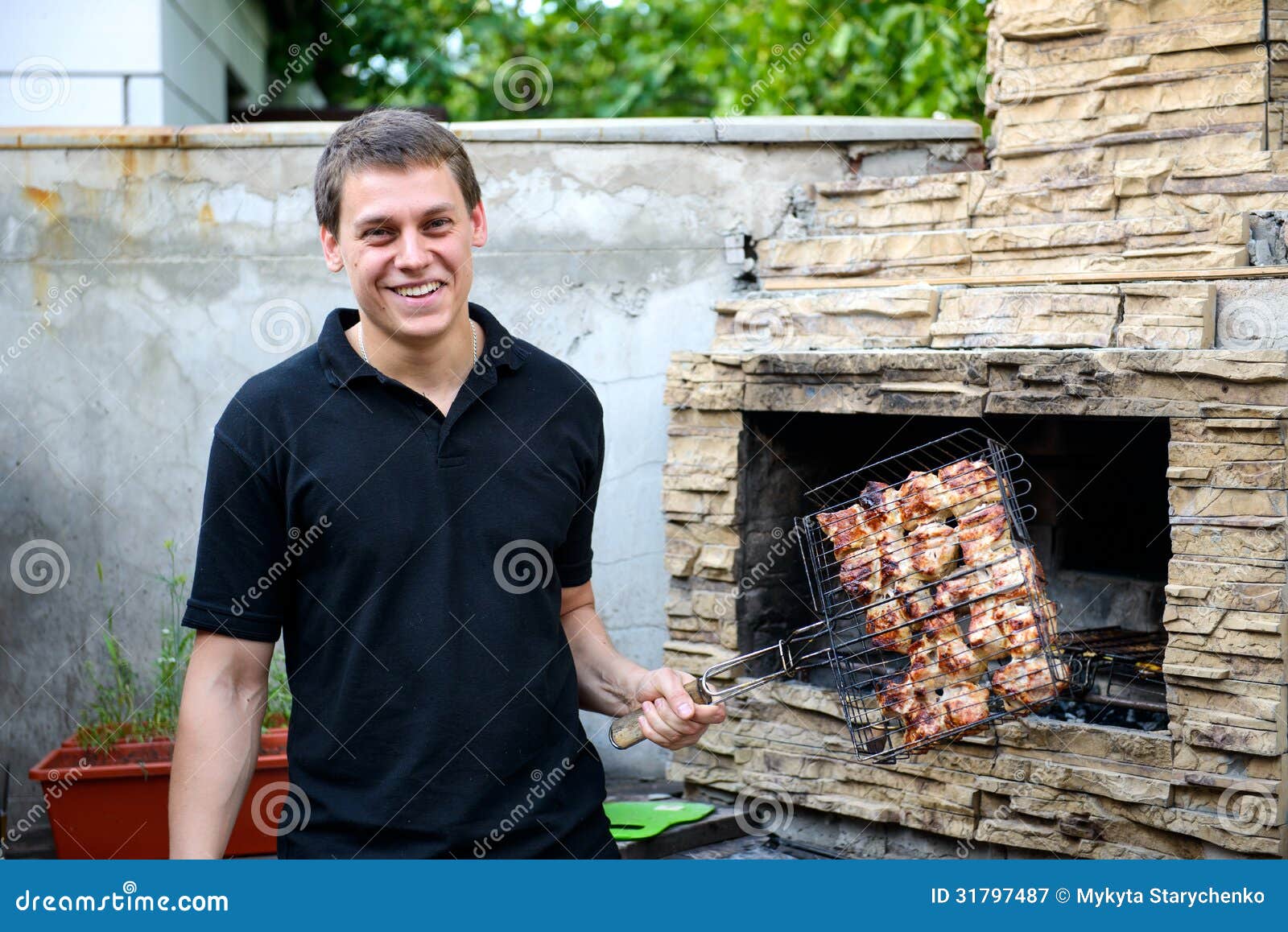 Happy man cooking barbecue stock image. Image of grill - 31797487